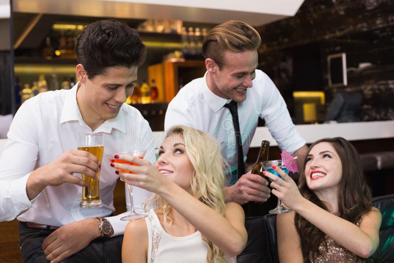 Happy Friends Having a Drink Together Stock Image - Image of view ...