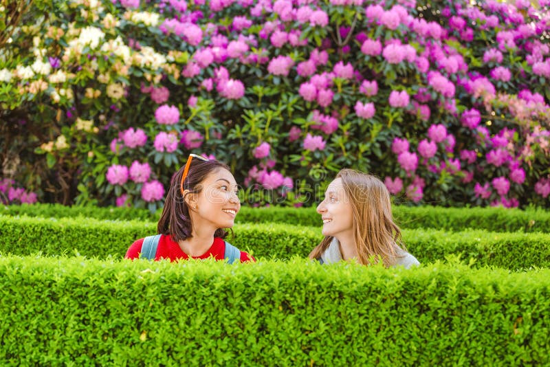Friends Having Fun in Blooming Park at Spring Stock Image - Image of ...