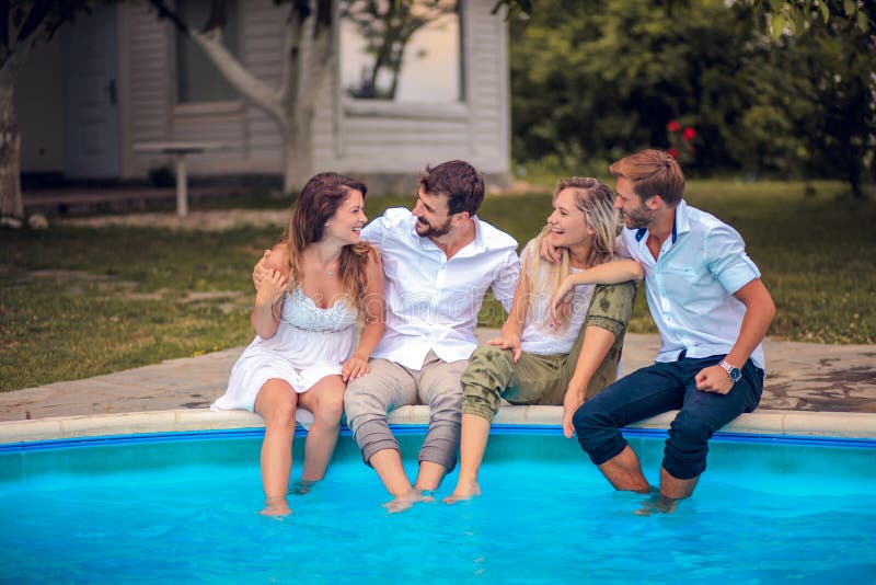 Friends Having Fun by the Pool Stock Photo - Image of life, candid ...