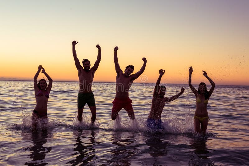 Happy Friends Having Fun in the Water Stock Photo - Image of paddling ...