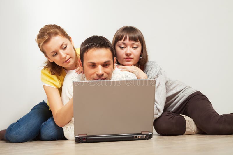Happy Friends with Laptop Computer Stock Photo - Image of person, floor ...