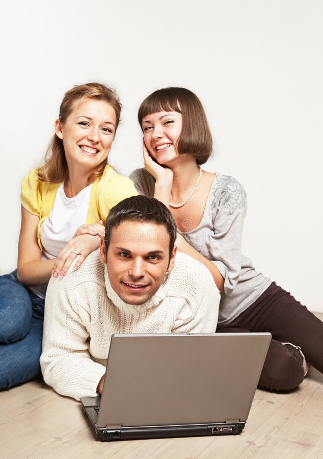 Happy Friends with Laptop Computer Stock Photo - Image of female ...