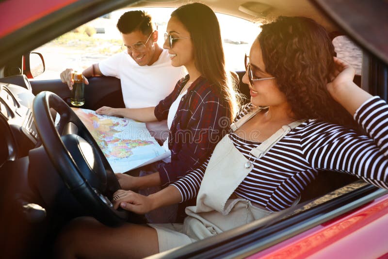 Happy Friends with Map in Car on Road Trip Stock Photo - Image of road ...