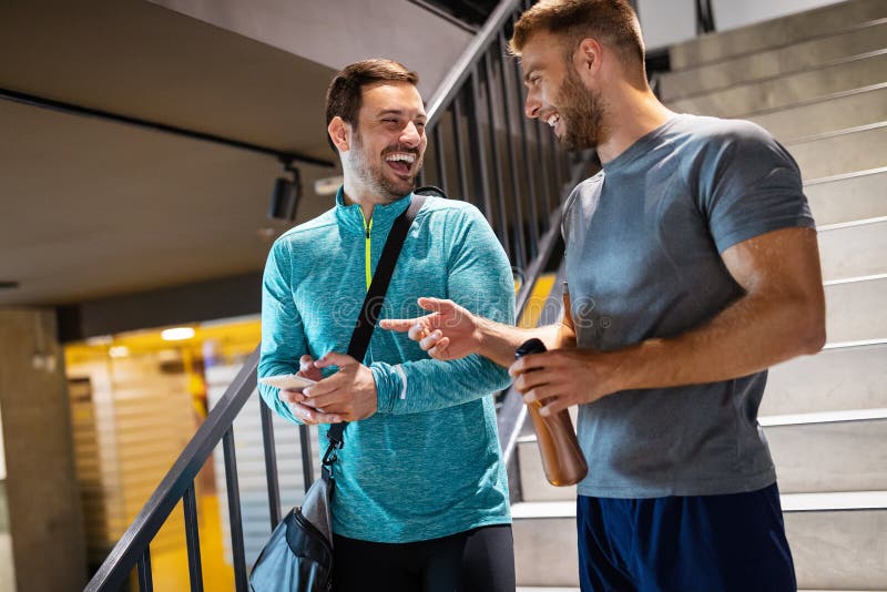 Happy Friends Enjoying Break while Chatting in the Gym Stock Photo ...