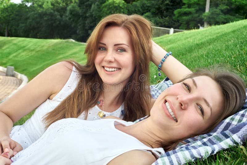 Happy friends in the park stock photo. Image of leisure - 74494514