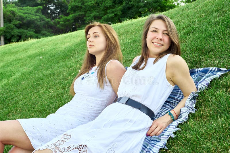 Happy friends in the park stock photo. Image of love - 75206804