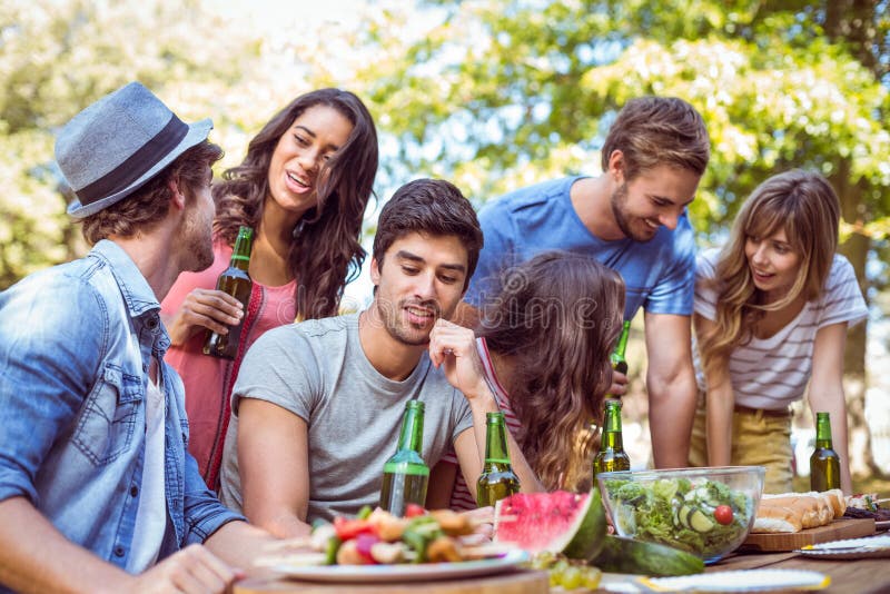 Happy Friends in the Park Having Lunch Stock Photo - Image of happy ...