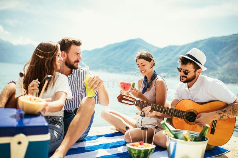 Friends Partying on the Beach with Drinks Stock Image - Image of ...