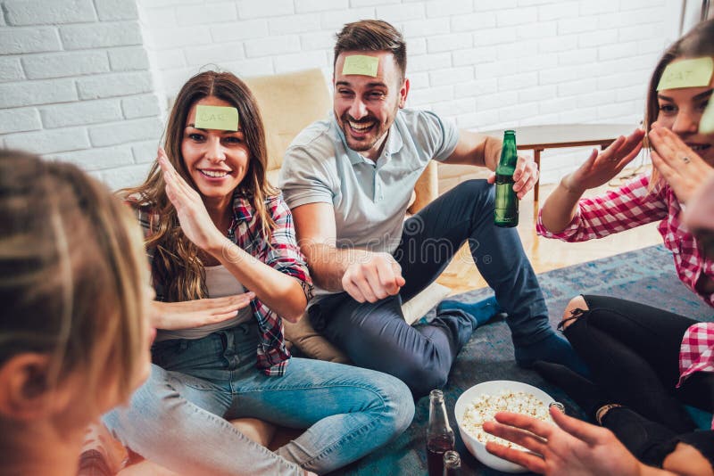 Happy Friends Playing Game Guess Who and Having Fun Stock Image - Image ...