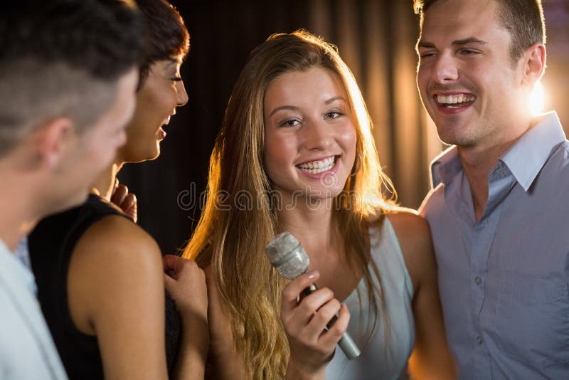 Happy Friends Singing Song Together Stock Image - Image of handsome ...