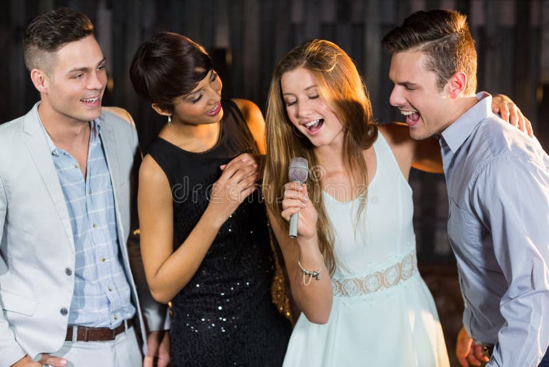 Happy Friends Singing Songs Together Stock Photo - Image of luxury ...