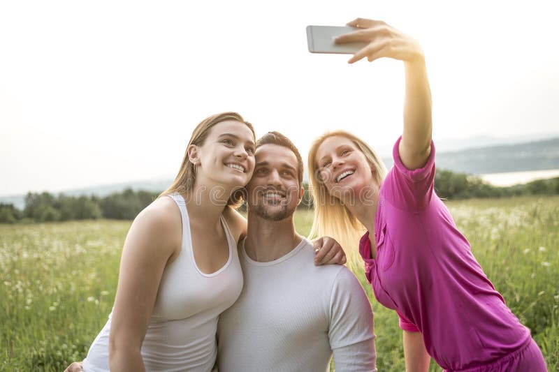 Happy Friends Spending Free Time Together in a Stock Photo - Image of ...