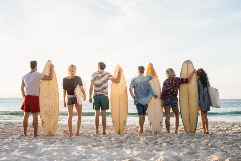 Happy Friends Standing Line Surfboards Stock Photos - Free & Royalty ...