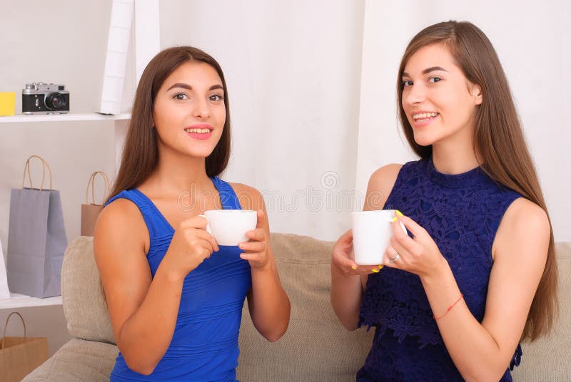 Two Happy Friends Talking and Drinking Coffee and Tea and Gossiping ...