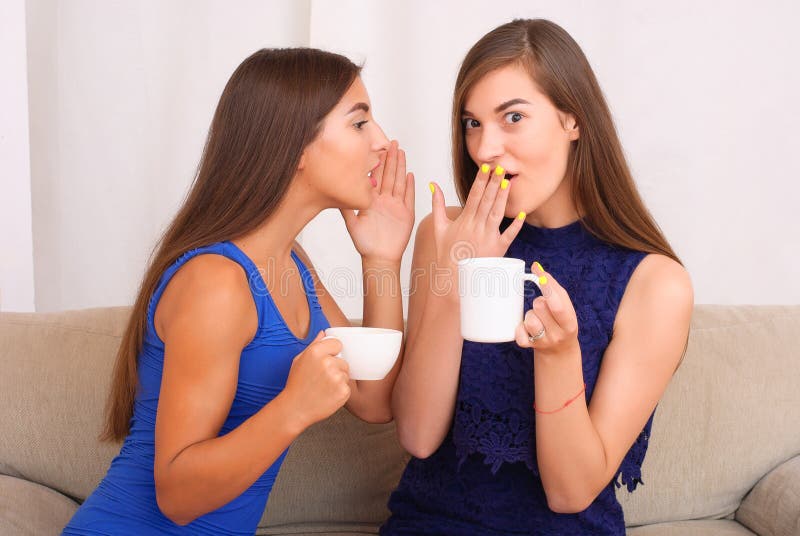 Three Happy Friends Talking and Drinking Coffee or Tea Stock Image ...