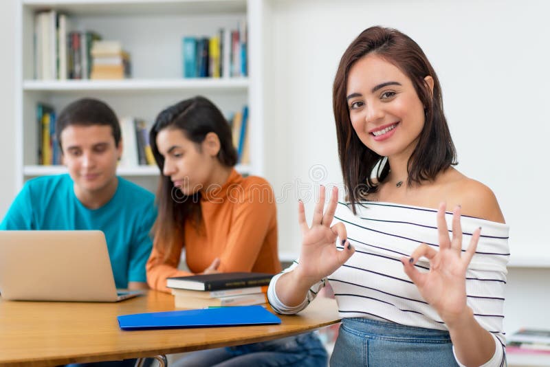 Happy German Female Student with Group of Computer Science Students ...