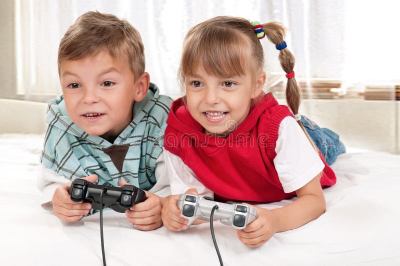 Happy Girl and Boy Playing a Video Game Stock Image - Image of game ...