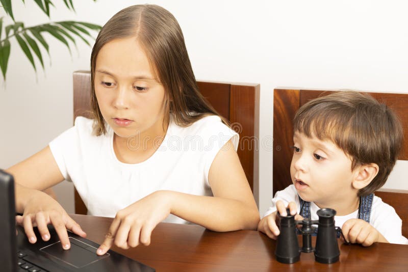 Happy Girl and Boy Using Laptop Stock Photo - Image of classroom ...