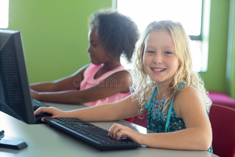Happy Girl with Classmate Using Computers Stock Image - Image of ...