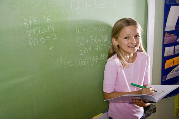 Happy Girl Doing Math on Blackboard in Class Stock Image - Image of ...