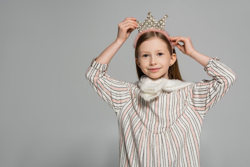 Girl Adjusting Crown Stock Photos - Free & Royalty-Free Stock Photos ...