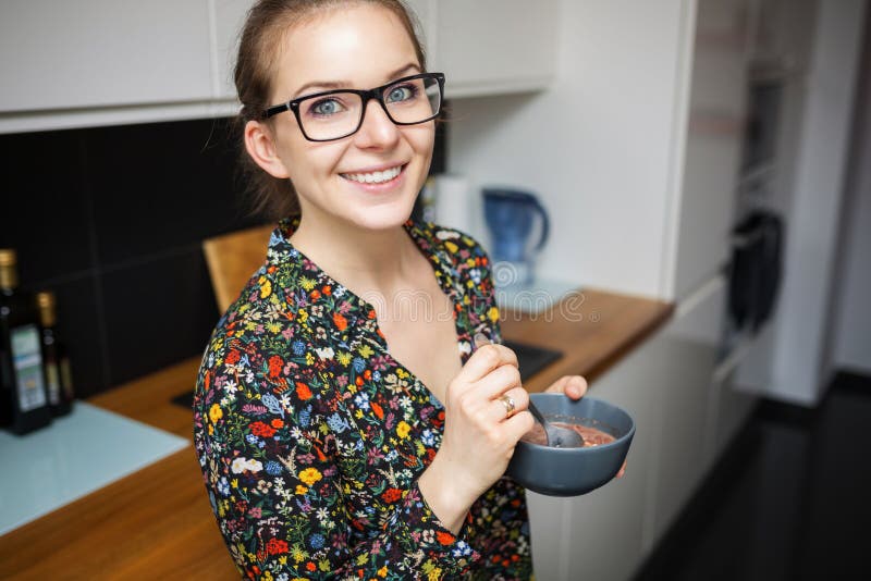 Happy Girl Eating Breakfast Stock Image - Image of toothy, kitchen ...