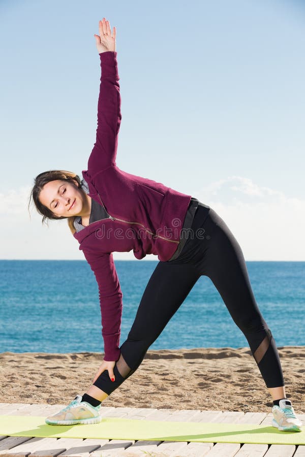 Girl Exercising with Dumbbells Stock Photo - Image of ground ...