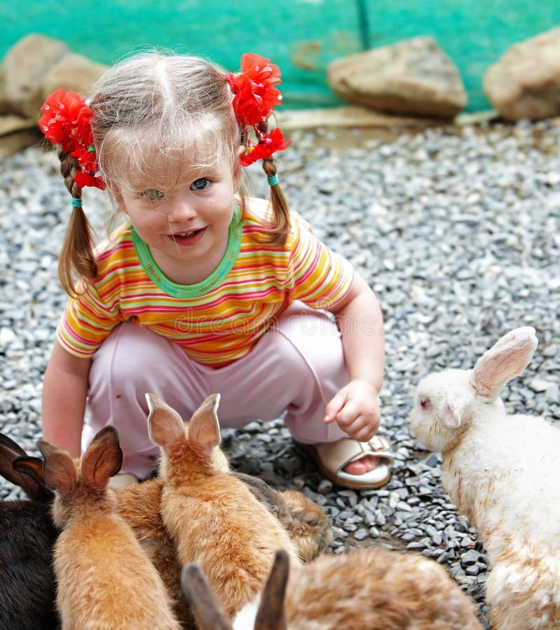Child and rabbit stock image. Image of girl, rural, nature - 27089497