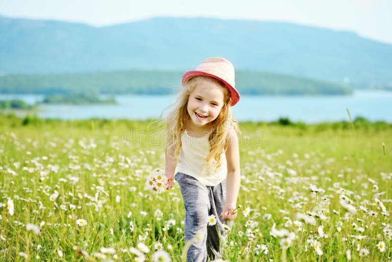 Happy girl in field stock photo. Image of jolly, cute - 55265538