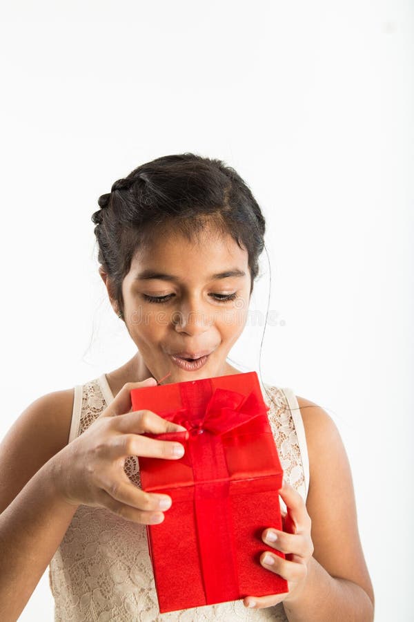 Happy girl gets gift stock photo. Image of indian, girl - 68771378