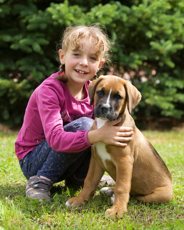 Happy girl with her puppy stock photo. Image of sociable - 29697848