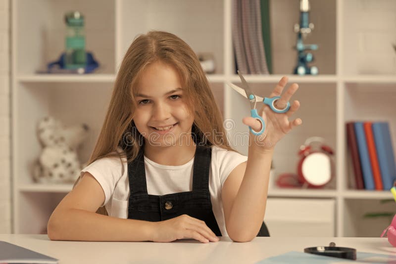 Happy Girl Hold Scissors in School Classroom Stock Photo - Image of ...