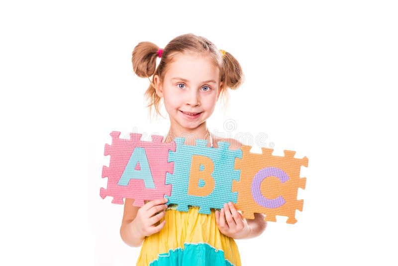 Happy Girl Holding Alphabet Letters ABC Stock Photo - Image of lesson ...