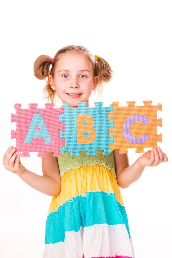 Happy Girl Holding Alphabet Letters ABC Stock Image - Image of happy ...