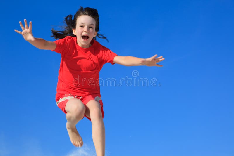 Girl jumping high in air stock image. Image of exaltation - 3541763