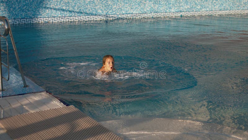 Happy Girl Jumping in the Pool and Laughing Stock Photo - Image of ...
