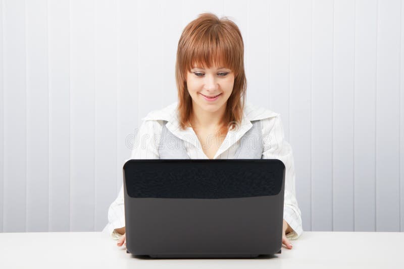 Happy girl with a laptop stock photo. Image of person - 18491622