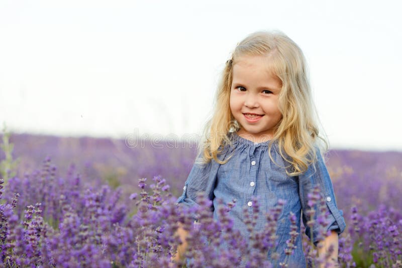 Happy Girl in Lavender Field Stock Photo - Image of hands, childhood ...