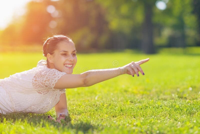 Happy Girl Laying on Meadow Stock Photo - Image of laying, female: 29262620