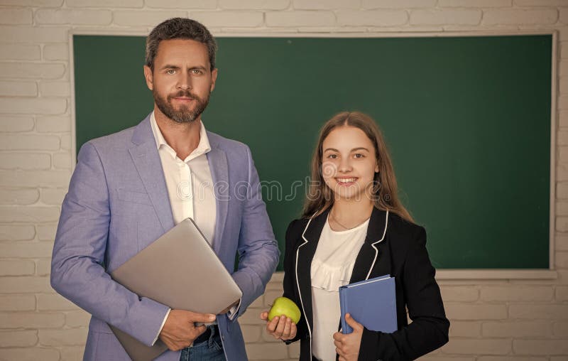 Happy Girl with Man Teacher in Classroom. Education Stock Image - Image ...