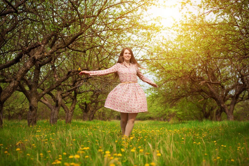 Happy Girl is Playing on a Green Spring Meadow Stock Image - Image of ...