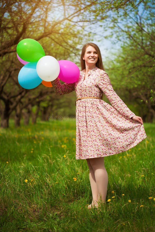 Happy Girl is Playing on the Green Spring Meadow Stock Photo - Image of ...