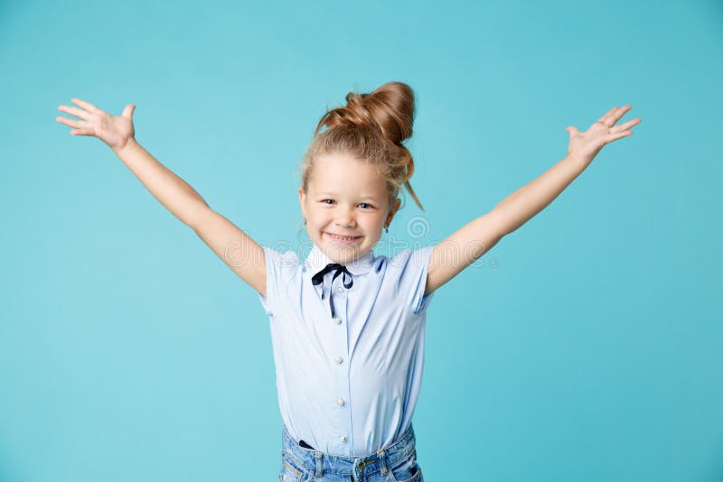 Happy Girl Posing in the Studio Isolated. Stock Photo - Image of child ...