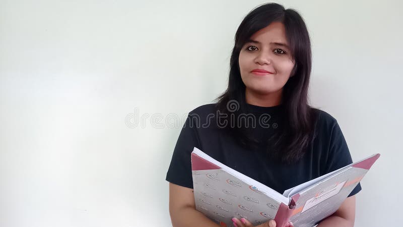 A Happy Girl with Register in Hand Stock Photo - Image of hair, limb ...