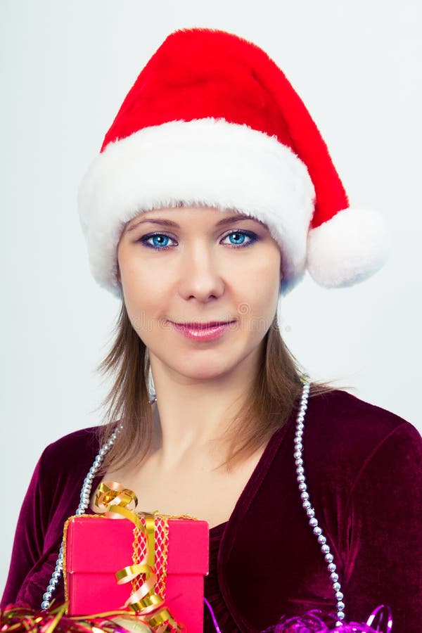 Happy Girl in Santa Hat with Gift Boxes Stock Photo - Image of ...