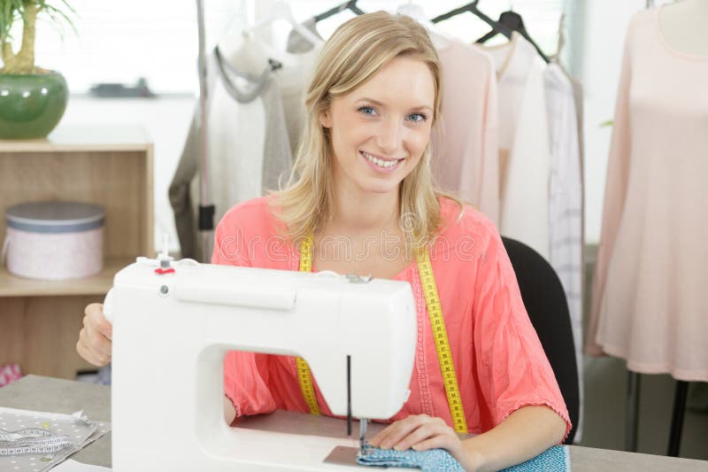 Happy Girl Seamstress Sitting on Sewing Machine Stock Photo - Image of ...