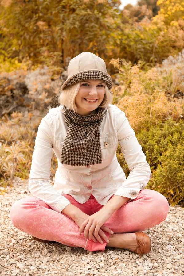 Happy Girl Sitting in Autumn Park Stock Photo - Image of foliage, fall ...