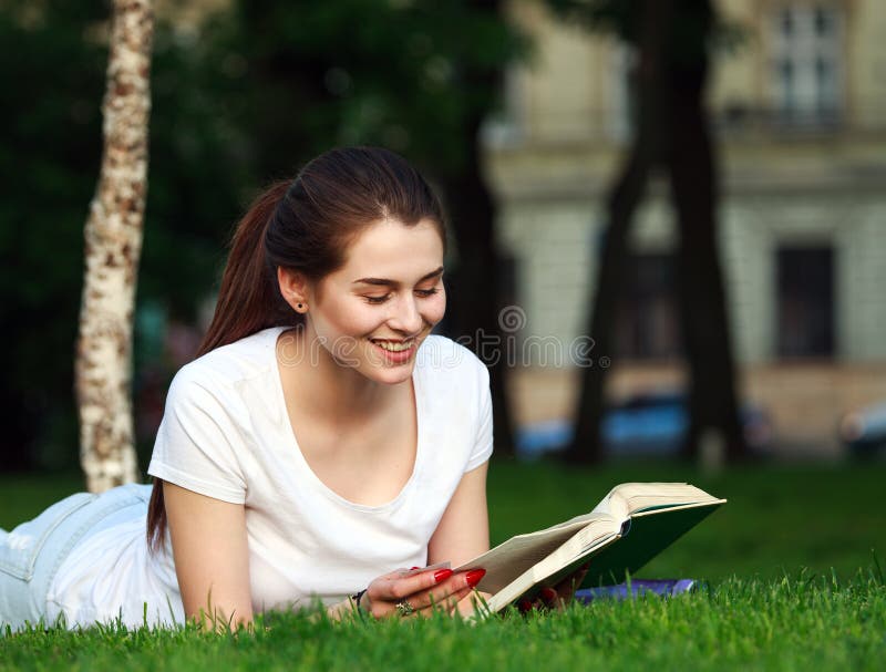 Happy Girl Student in City Park Reading a Book Stock Image - Image of ...
