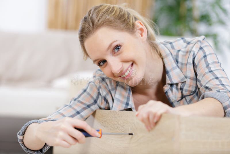 Happy girl with tools stock image. Image of business - 158693943