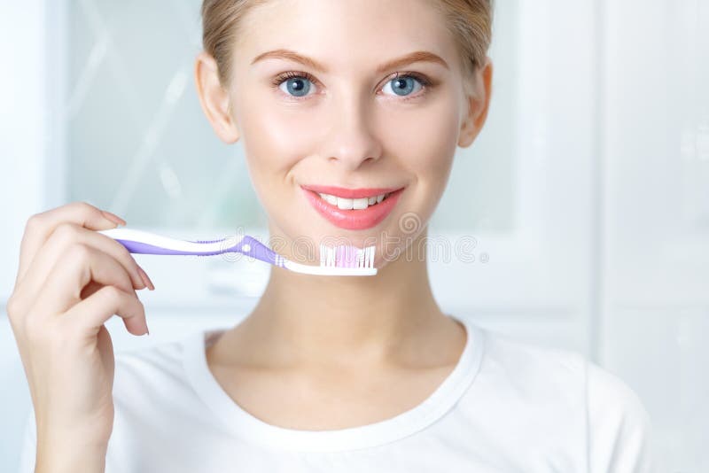 Happy Girl with Toothbrush stock photo. Image of happy - 82117390